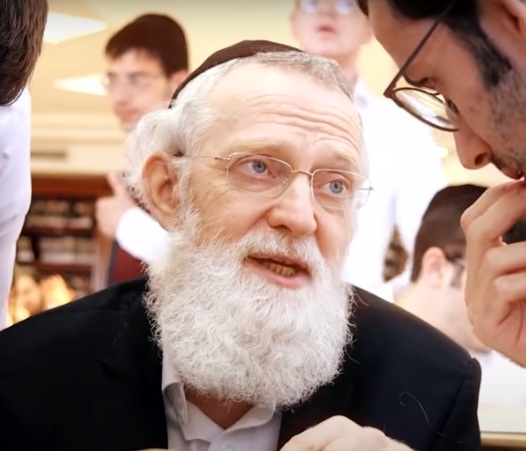 Rav Asher Arieli Sharing an Umbrella - 5 Towns Central